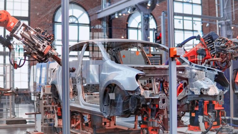 How to Improve Electric Car Manufacturing with Robots - RoboDK blog